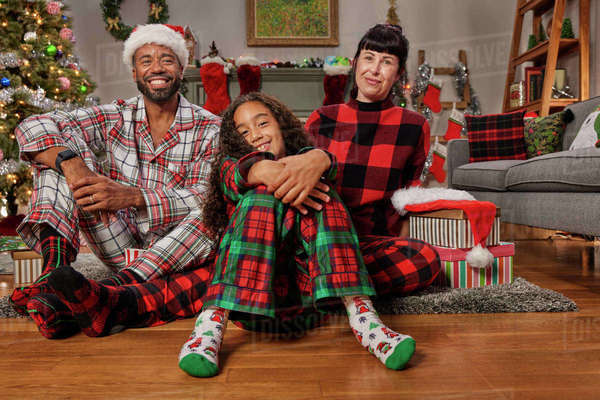 Multi cultural family celebrating Christmas. - Stock Photo - Dissolve