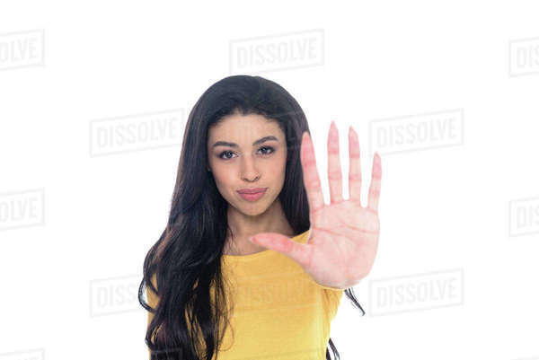 Smiling African American Girl Showing Stop Sign And Looking At Camera Isolated On White Stock