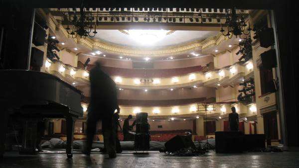 Working scenes dismantle scenery after performance in theatre ...