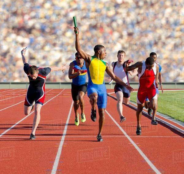 Six Athletes Running Relay Race Stock Photo Dissolve Six Athletes Running Relay Race Stock Photo Dissolve