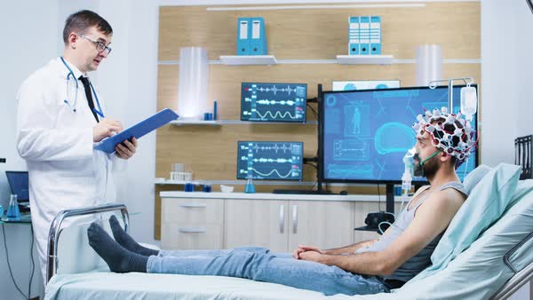 Doctor in brain activity making a study on human brain in a neurology ...