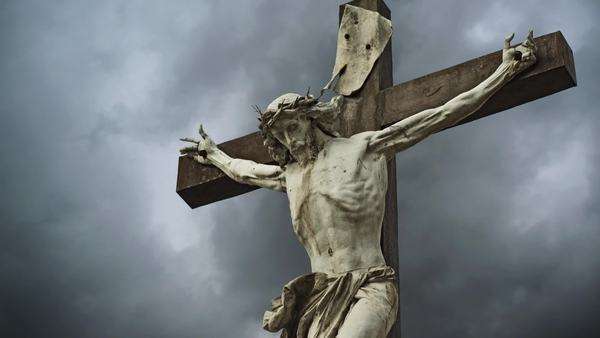 Crucifixion. Christian cross with Jesus Christ statue over stormy clouds timelapse - Stock Video ...