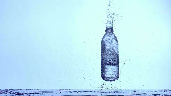 Water bottle falling and splashing, slow motion - Stock Video Footage ...