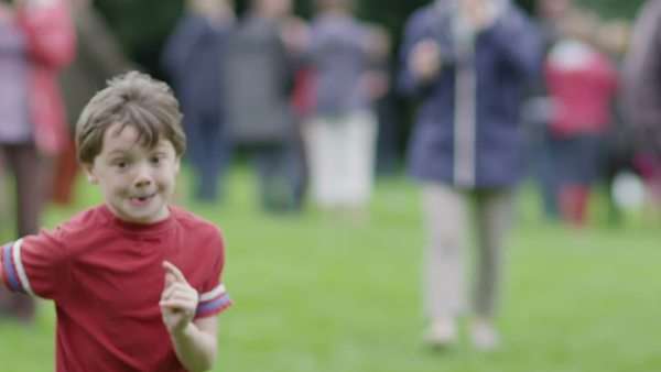 A 6-year-old school boy running during a sports event, slow motion - HD ...
