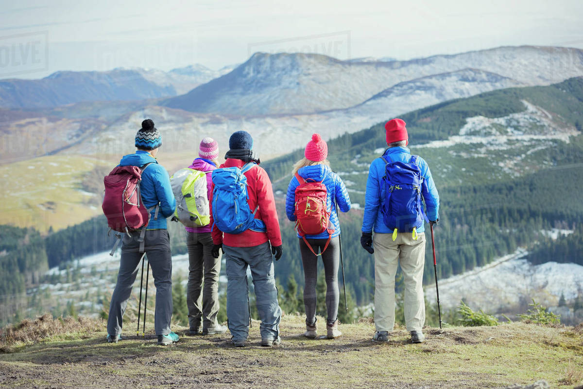Family hiking on mountain - Royalty-free Stock Photo | Dissolve