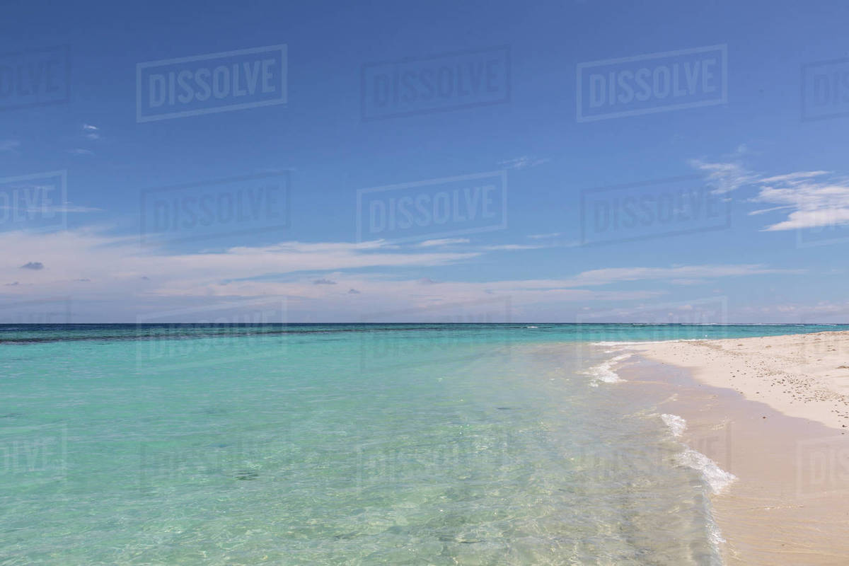 Sunny, tranquil, remote ocean beach, Maldives - Royalty-free Stock ...
