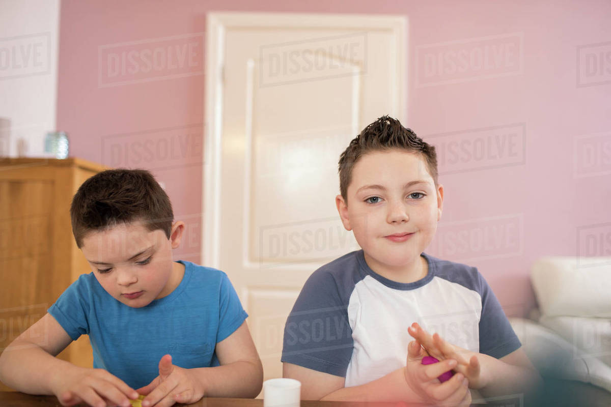 Portrait confident boy playing with brother - Royalty-free Stock Photo ...