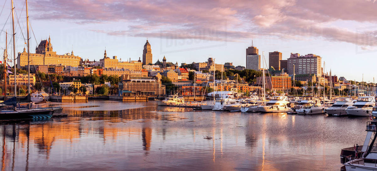 Canada, Quebec, Quebec City, Coastline with marina and buildings ...
