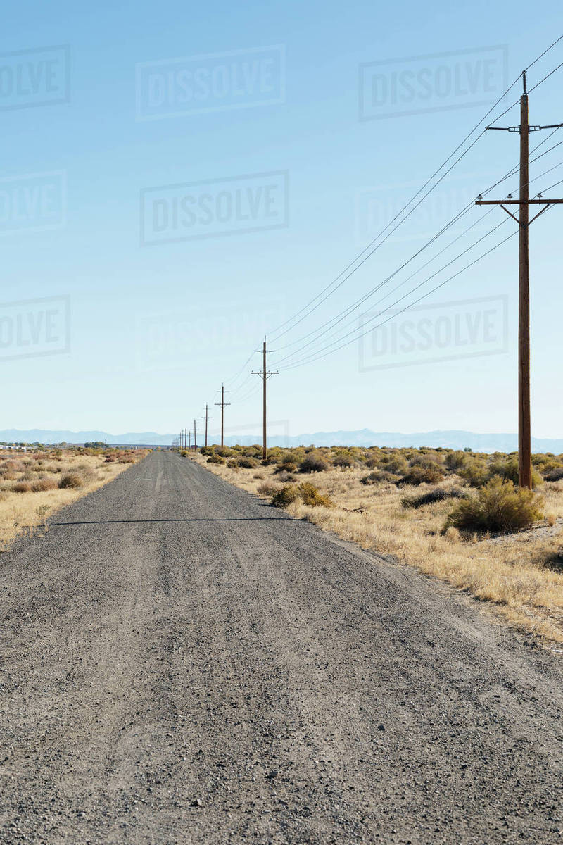 USA, Nevada, Highway 50, Electricity pylons next to road - Royalty-free ...