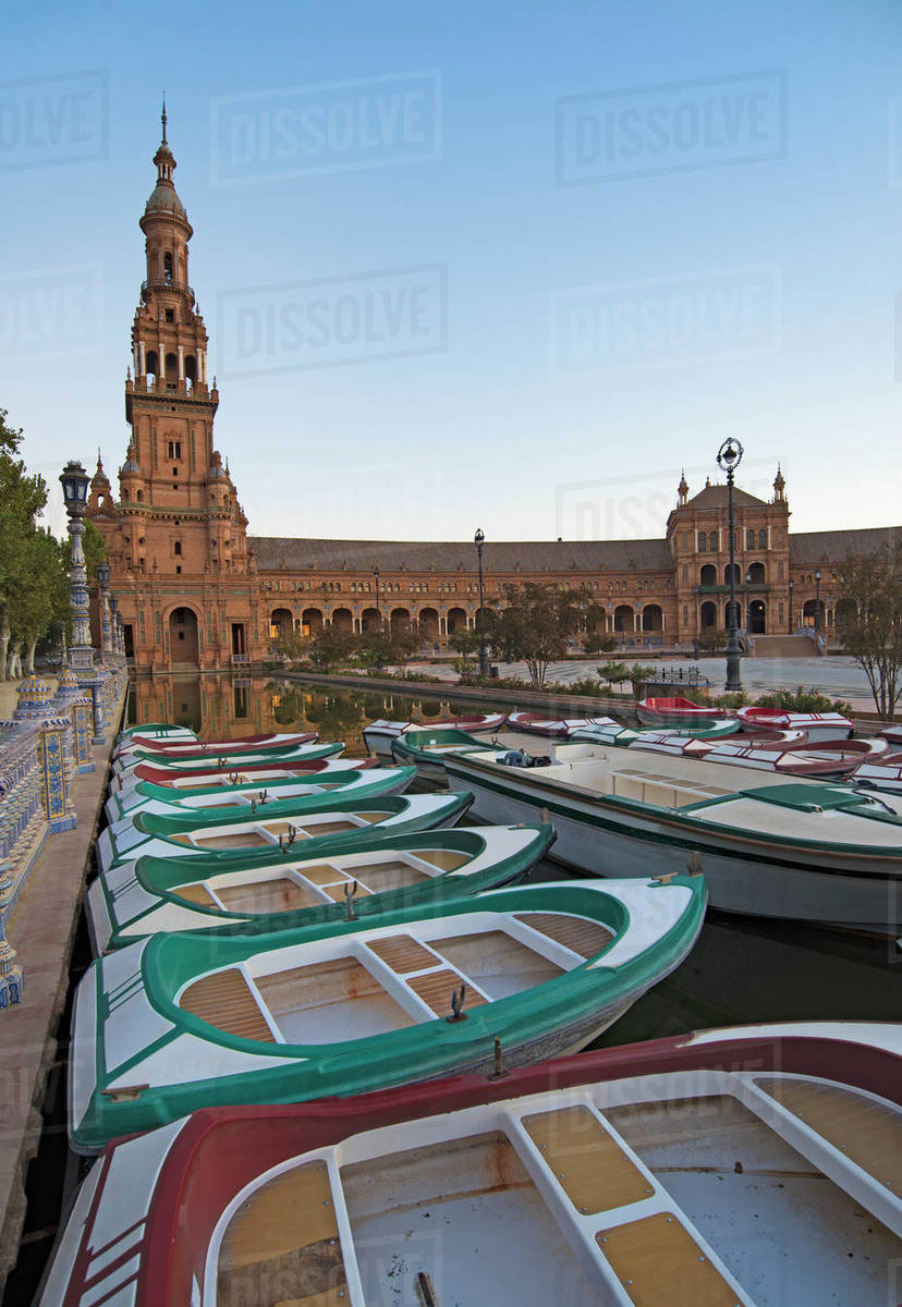 Spain, Seville, Boats floating on pond next to Plaza De Espana - Stock ...