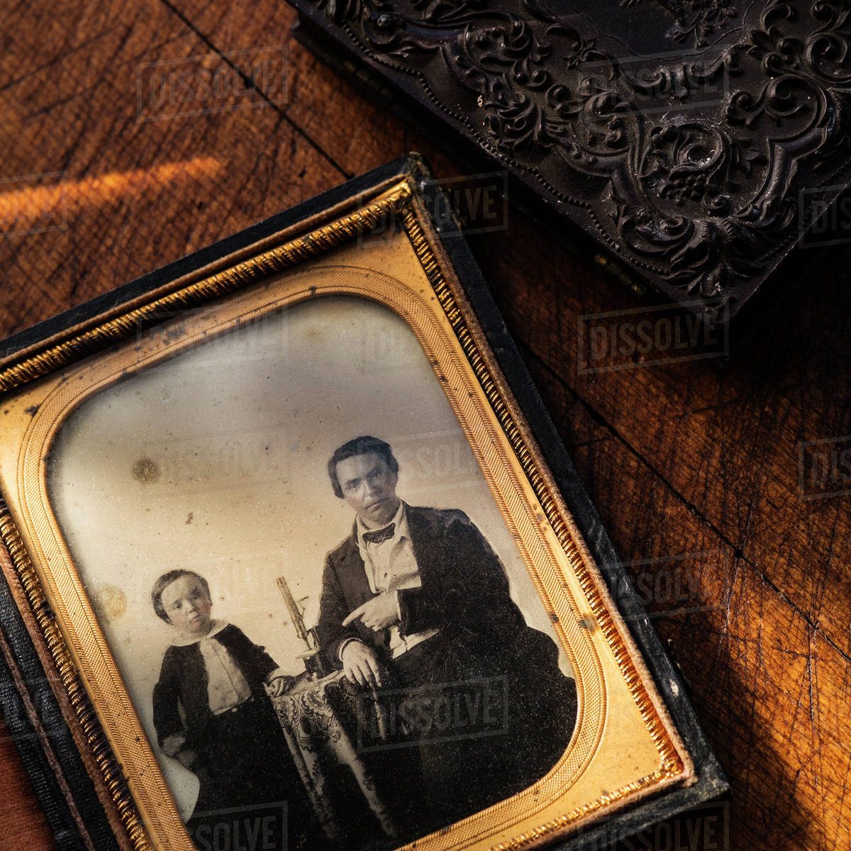 Studio shot of old fashioned photograph in picture frame - Stock Photo ...