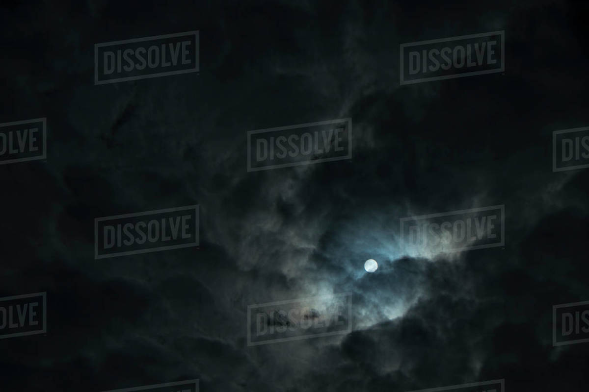 Full moon in dramatic night sky - Royalty-free Stock Photo | Dissolve