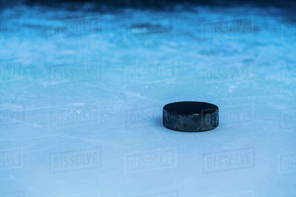 Hockey puck on ice - Royalty-free Stock Photo | Dissolve