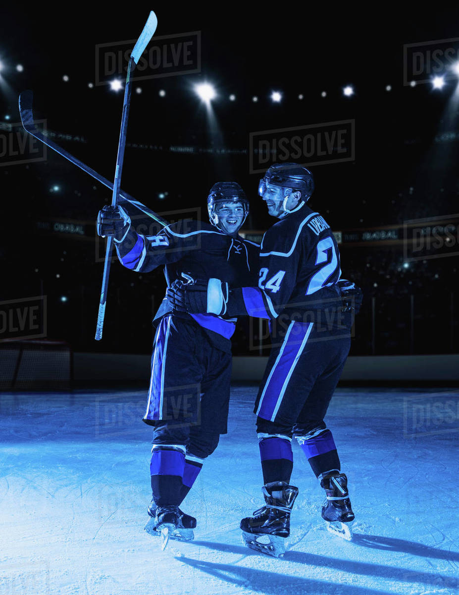 Hockey players celebrating - Stock Photo - Dissolve