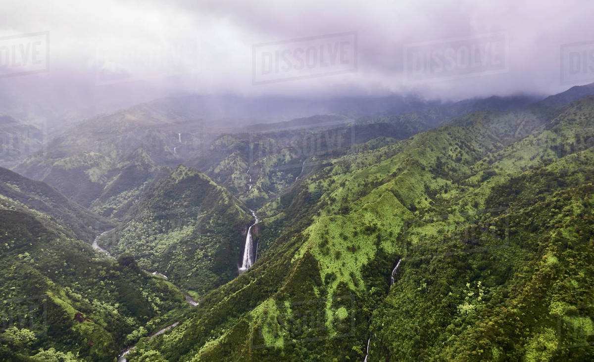 USA, Hawaii, Kauai, Na Pali, Waterfall in mountains - Stock Photo ...