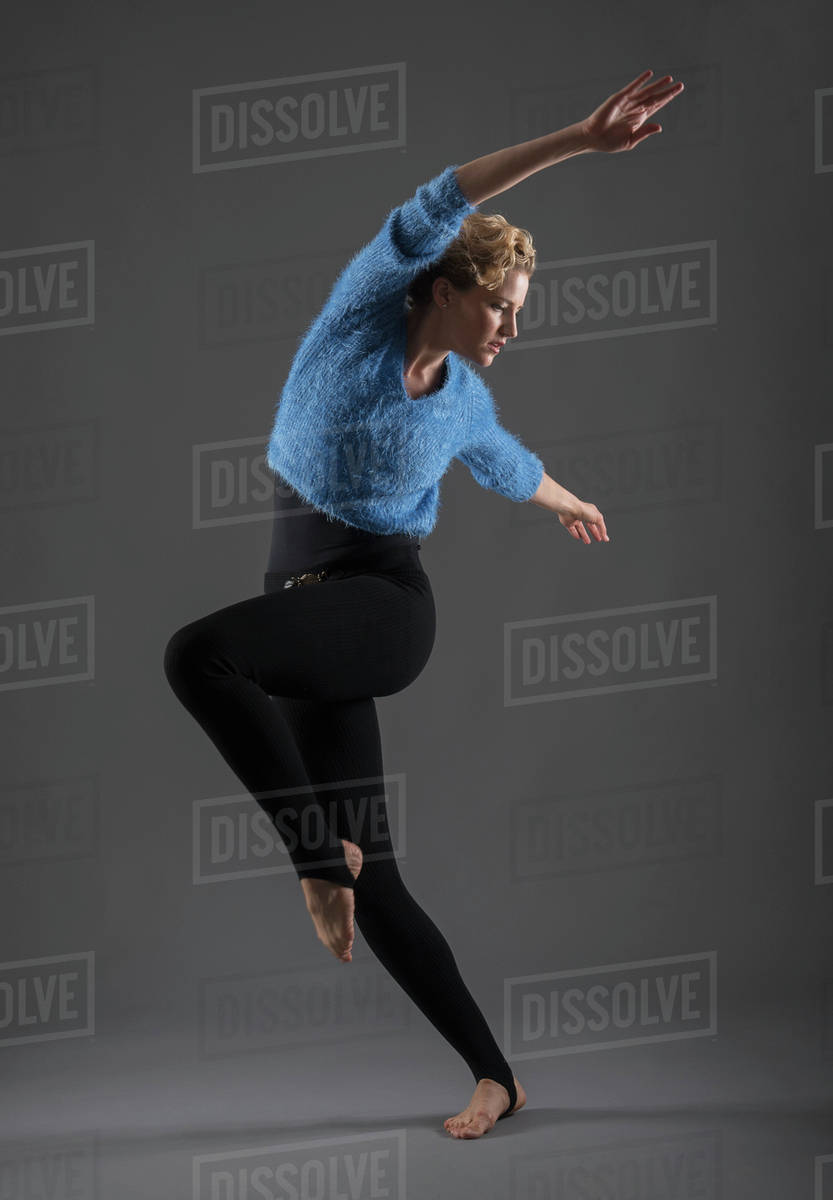 Studio shot of female ballet dancer - Stock Photo - Dissolve