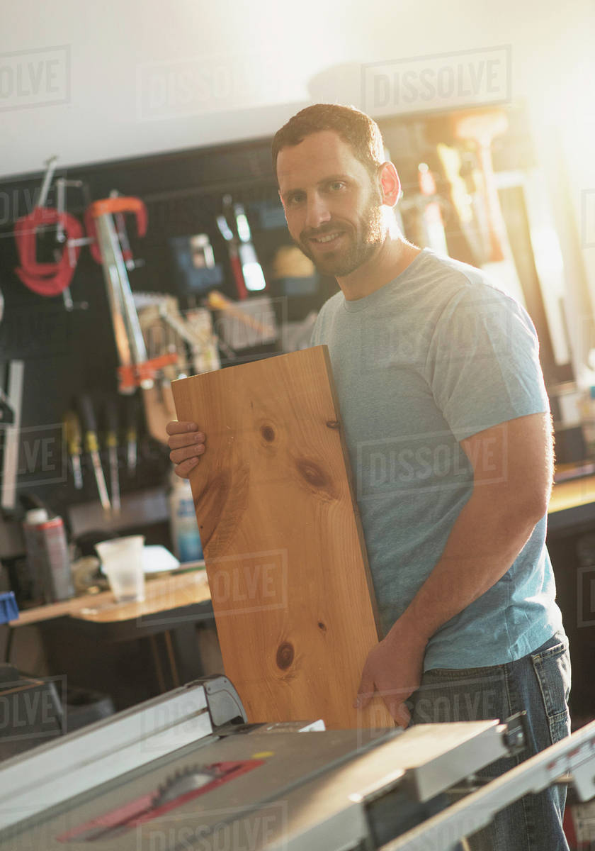 Man working in workshop - Stock Photo - Dissolve