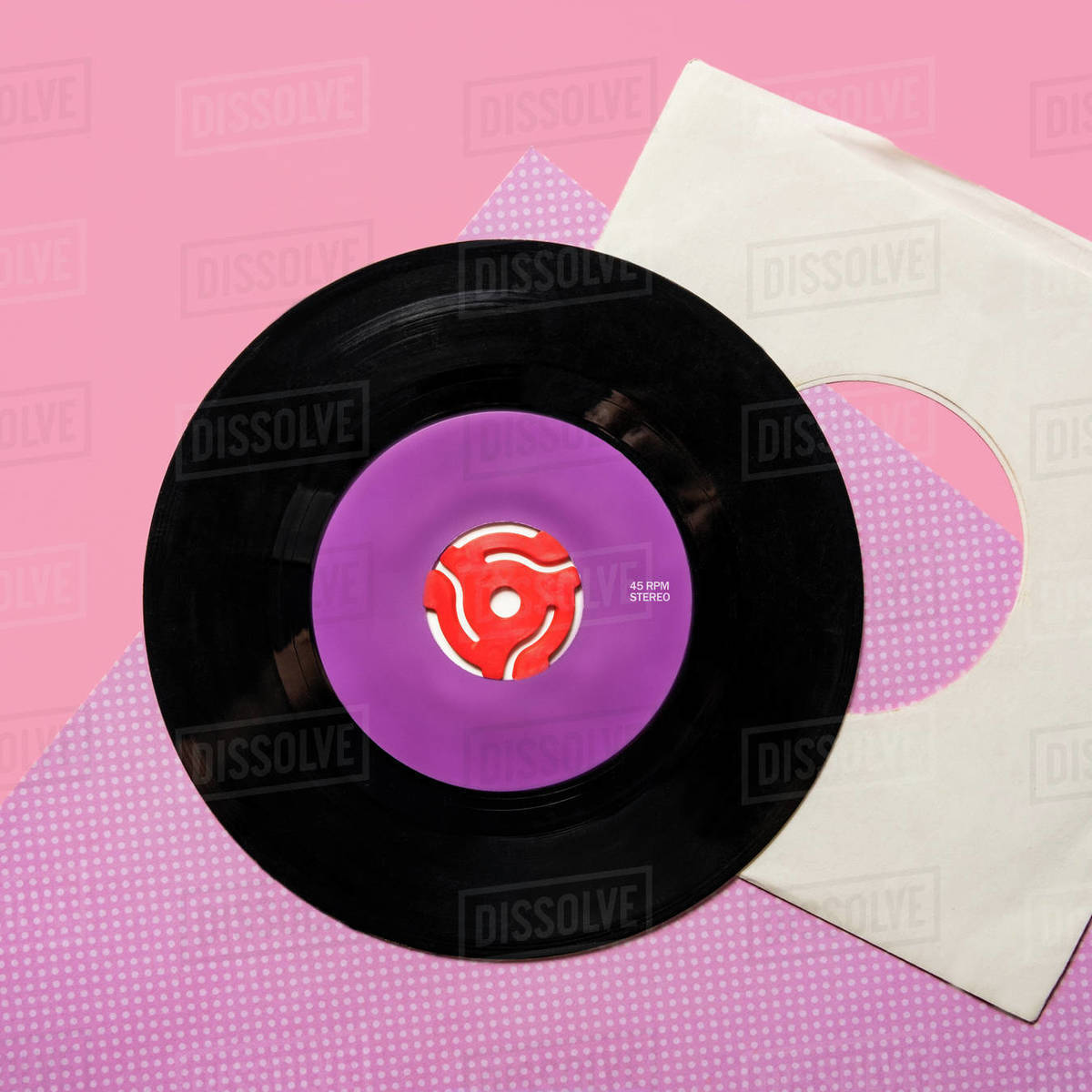 Vintage record on pink and purple background - Stock Photo - Dissolve