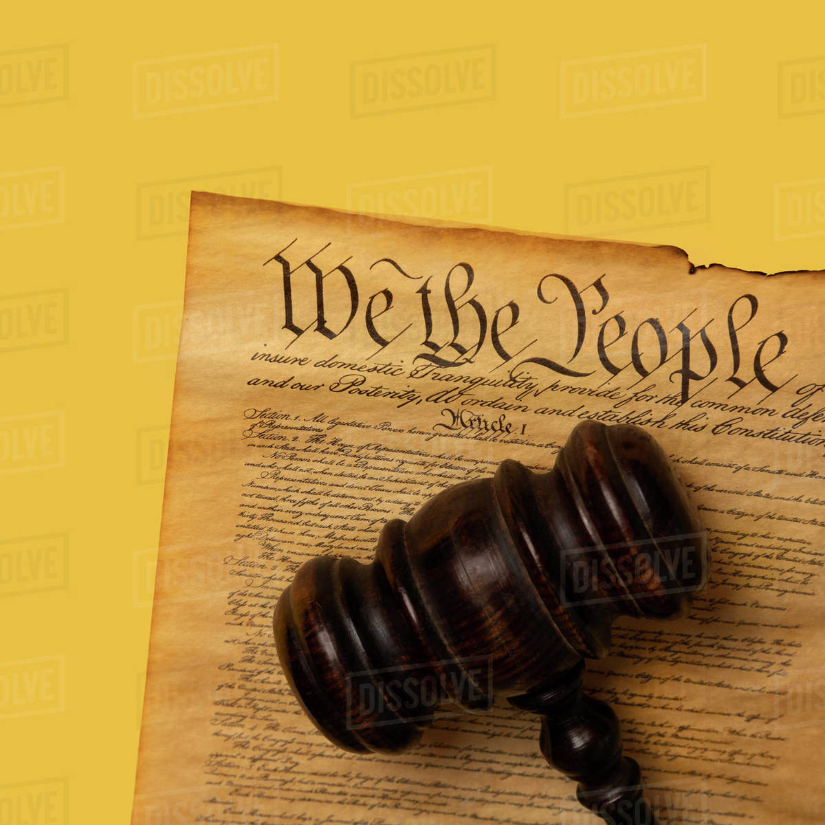 US Constitution with gavel - Stock Photo - Dissolve