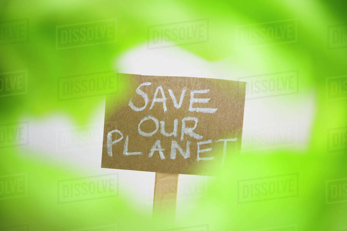 Placard reading save our planet - Royalty-free Stock Photo | Dissolve