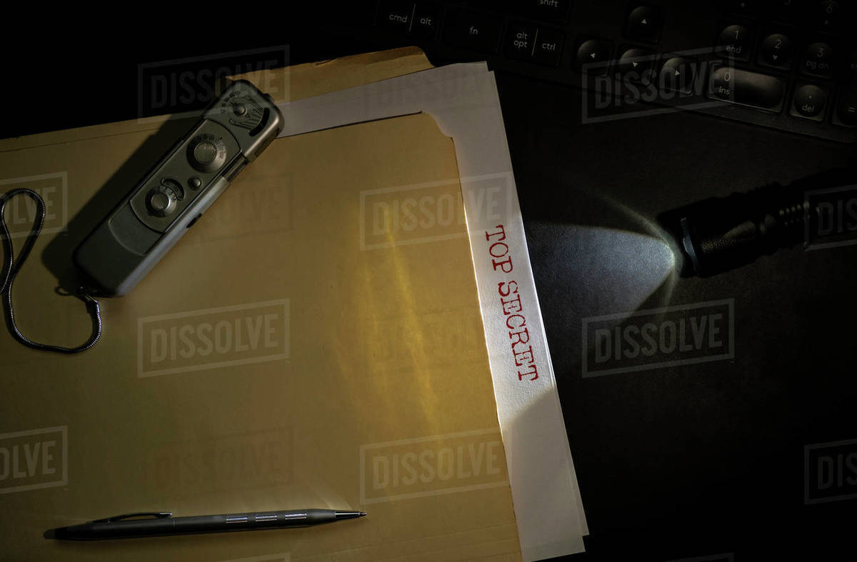 Overhead view of top secret documents on desk top - Royalty-free Stock ...