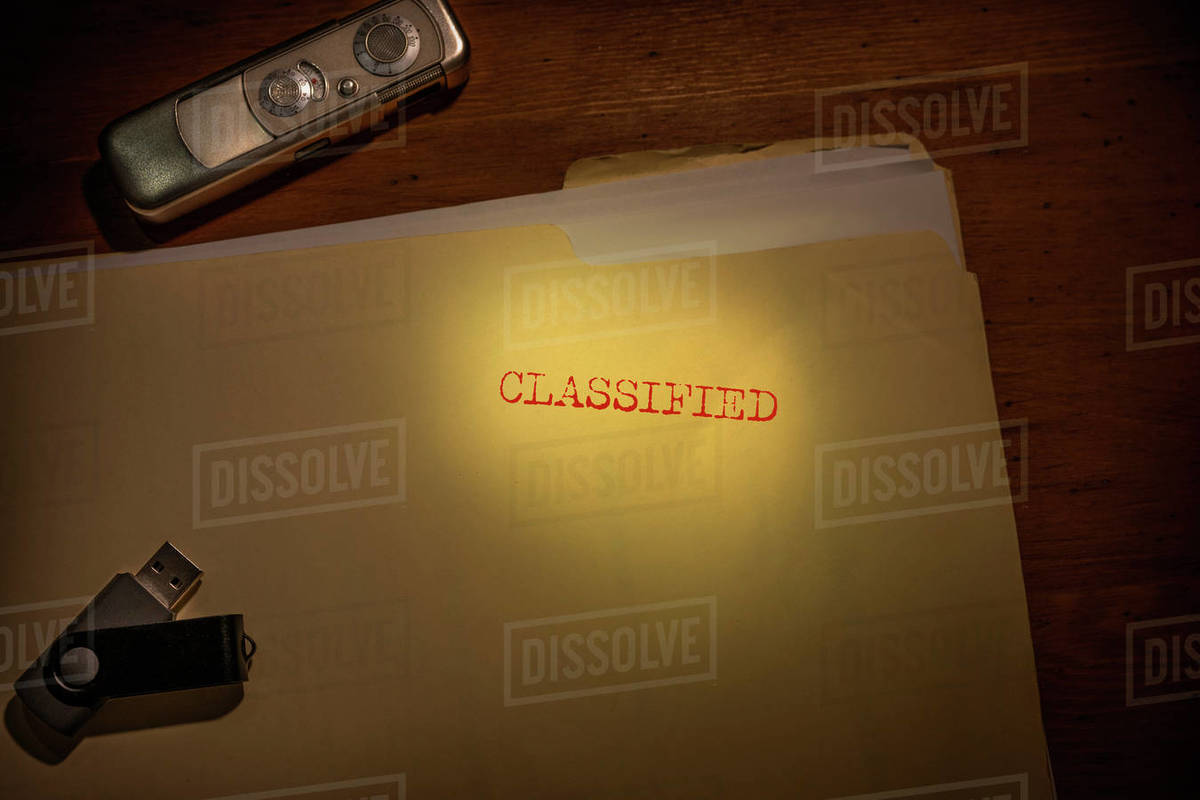 Folder marked Classified with spy camera and thumb drive - Royalty-free ...