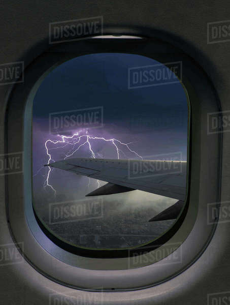 Thunderstorm and lightning view from airplane window - Stock Photo ...