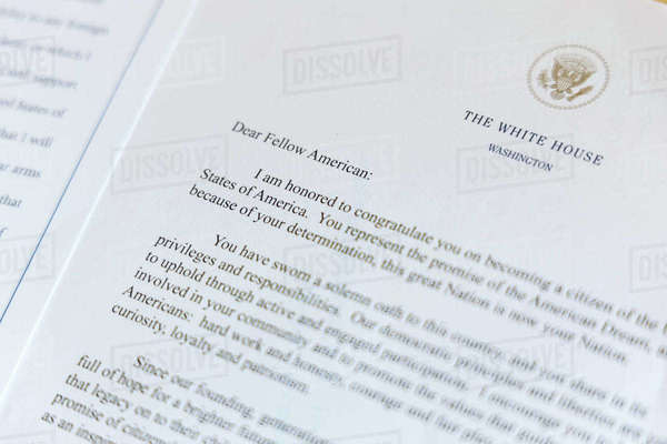 US citizenship welcome letter from President - Stock Photo - Dissolve