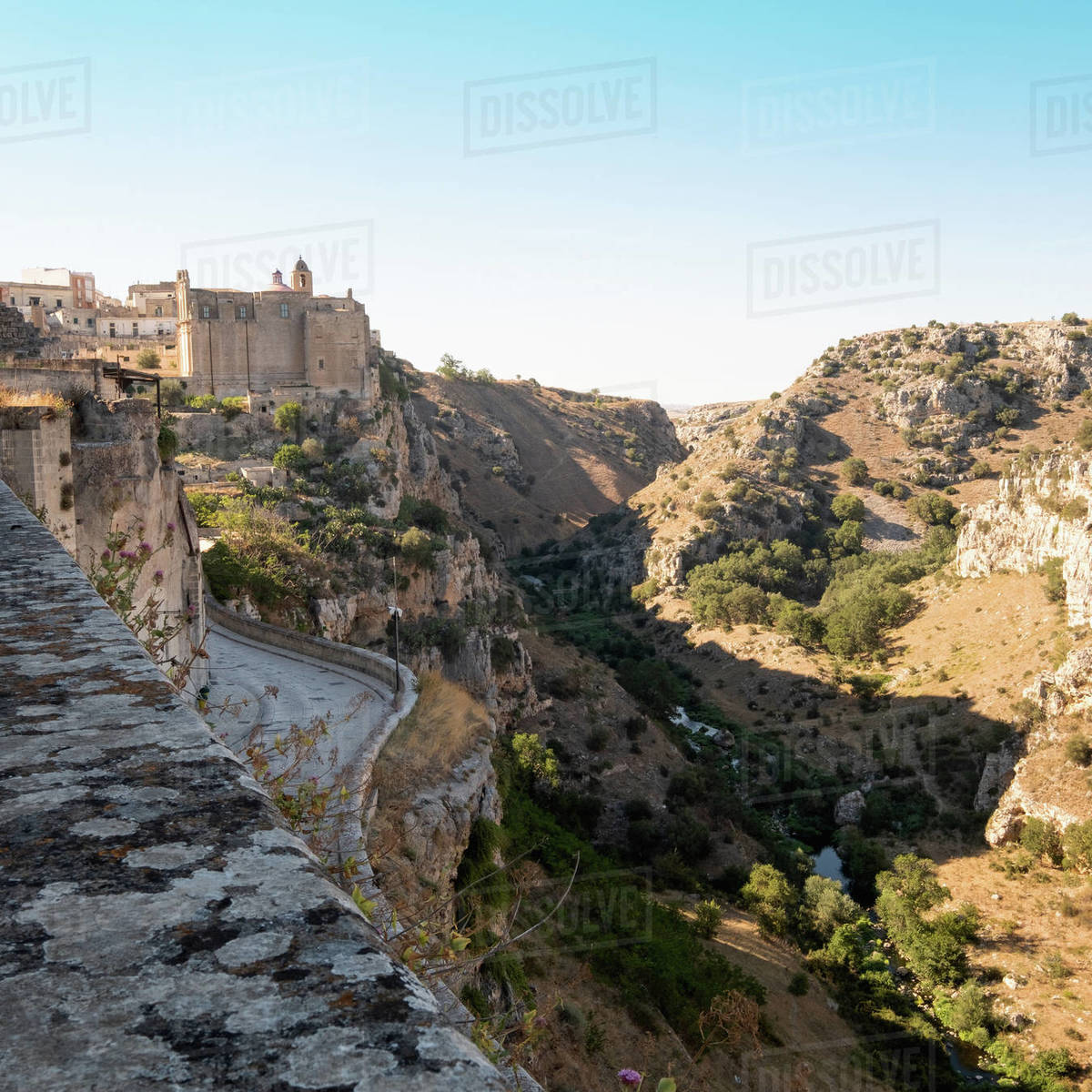 Italy, Basilicata, Matera, Medieval town next to canyon - Stock Photo ...