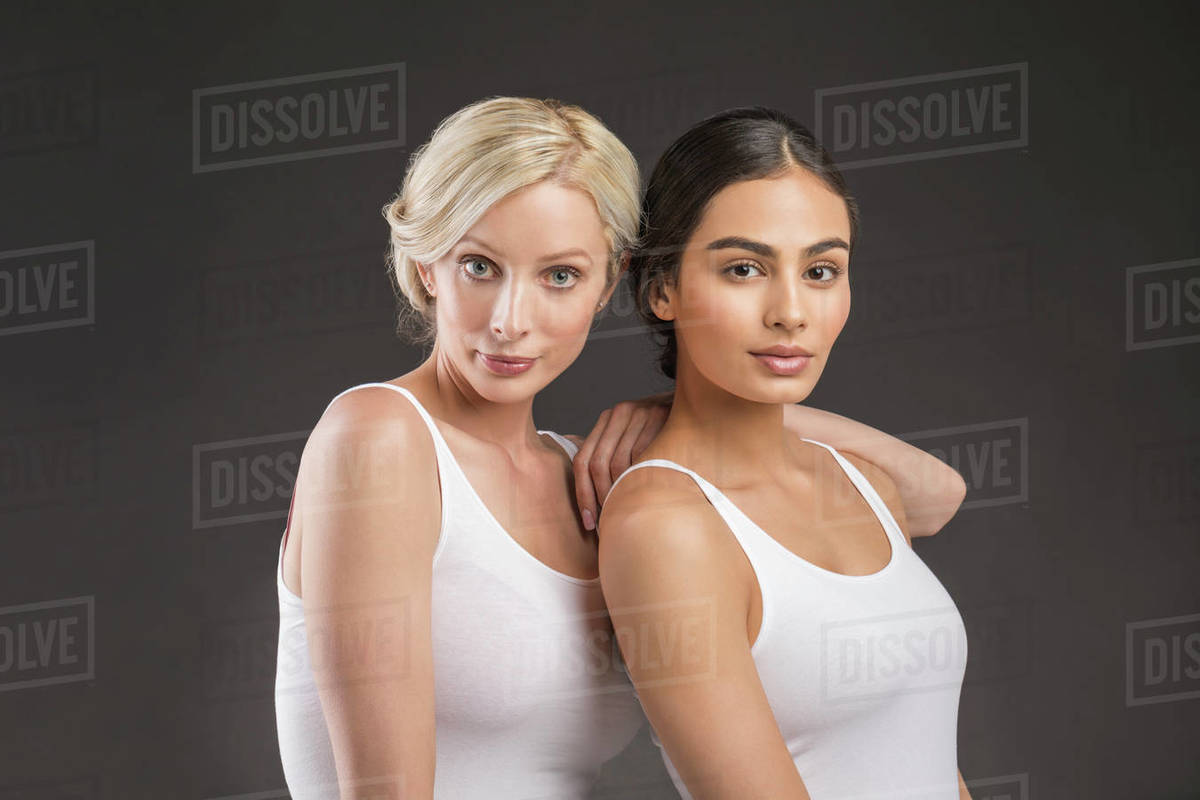 Studio portrait of two beautiful women - Royalty-free Stock Photo ...