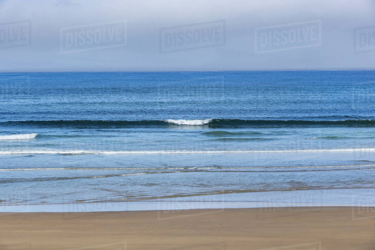 USA, Oregon, Calm sea at Cannon Beach - Royalty-free Stock Photo | Dissolve