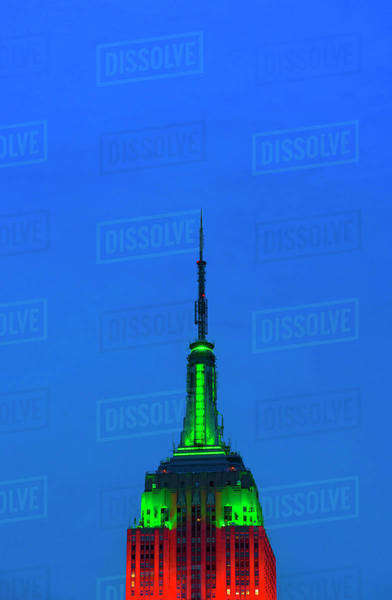 Empire State Building illuminated in red and green - Royalty-free Stock ...
