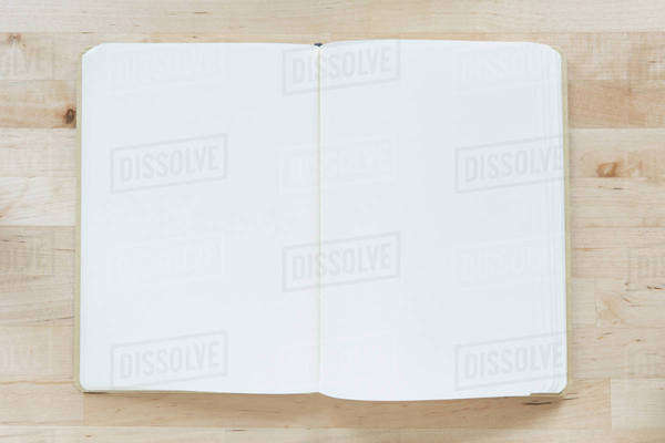 Overhead view of opened notebooks - Royalty-free Stock Photo | Dissolve