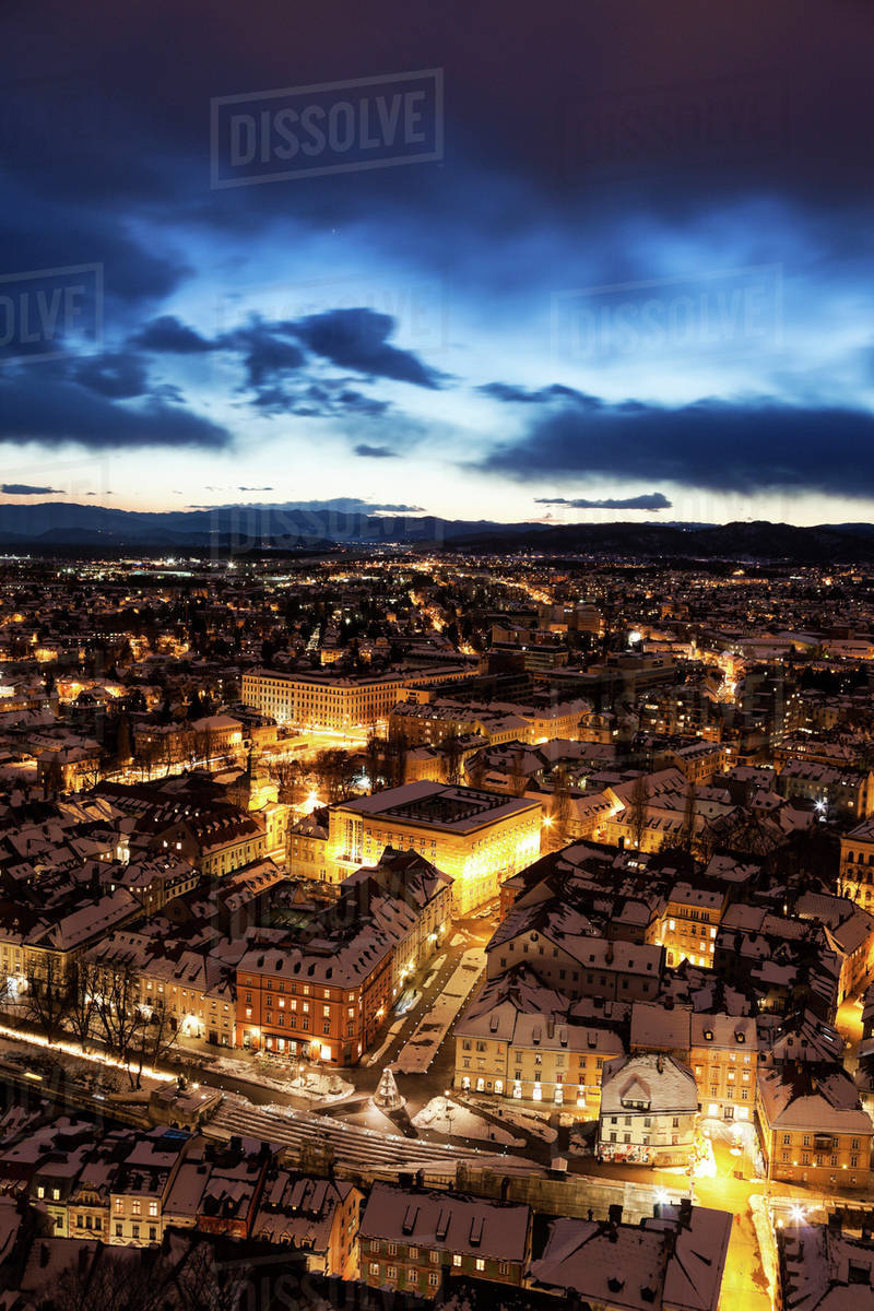 Illuminated cityscape at dusk - Royalty-free Stock Photo | Dissolve