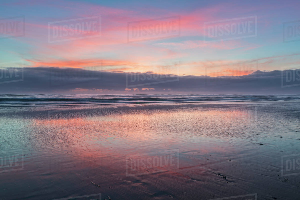 Sky reflecting in water at sunset - Royalty-free Stock Photo | Dissolve