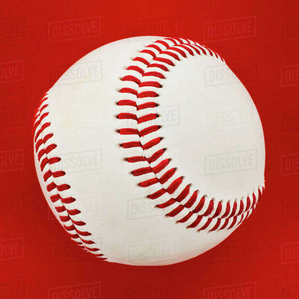 Baseball on red background - Royalty-free Stock Photo | Dissolve