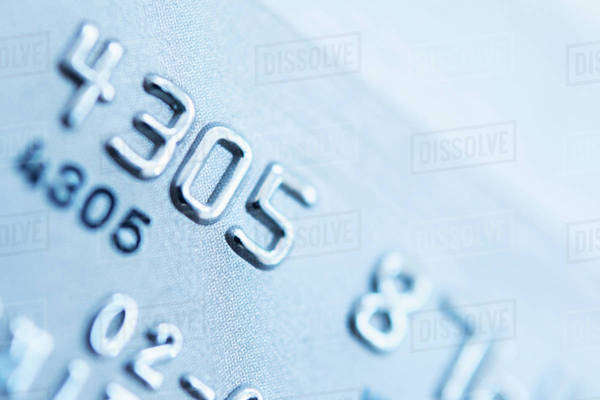 Detail of credit card, studio shot - Stock Photo - Dissolve