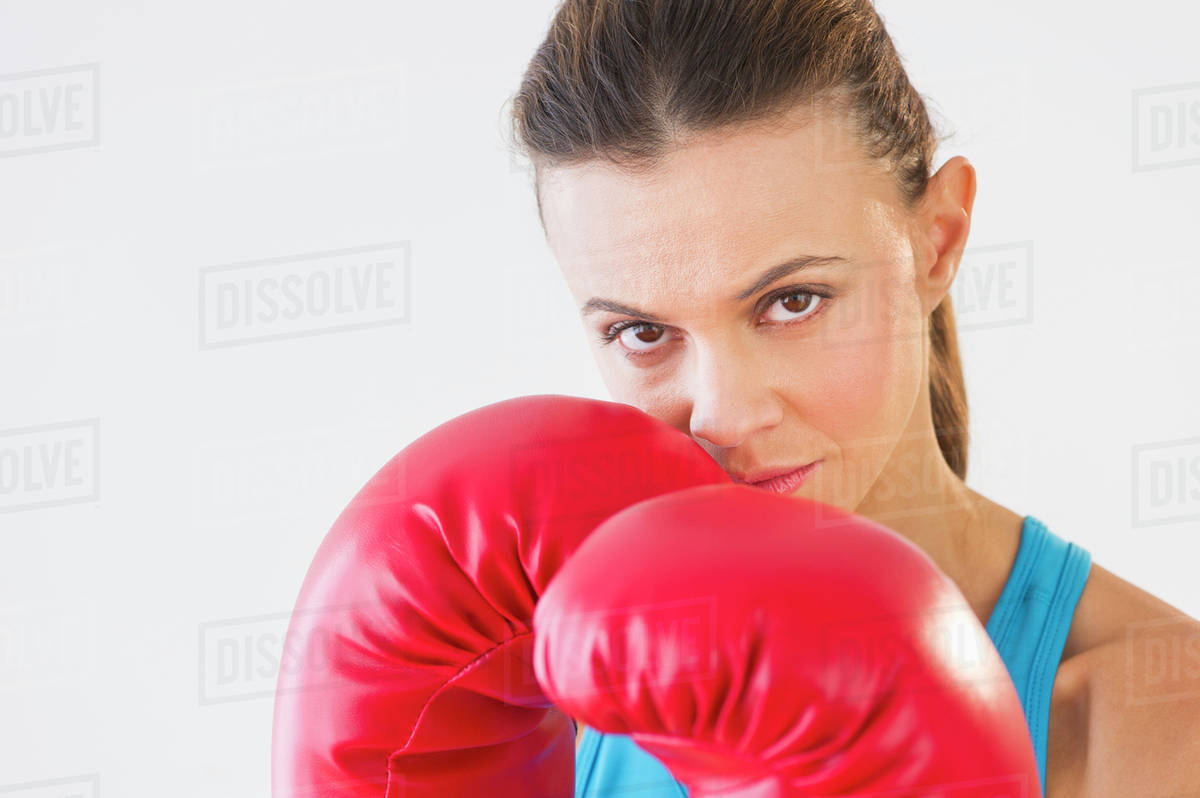 Studio shot of woman boxing - Royalty-free Stock Photo | Dissolve