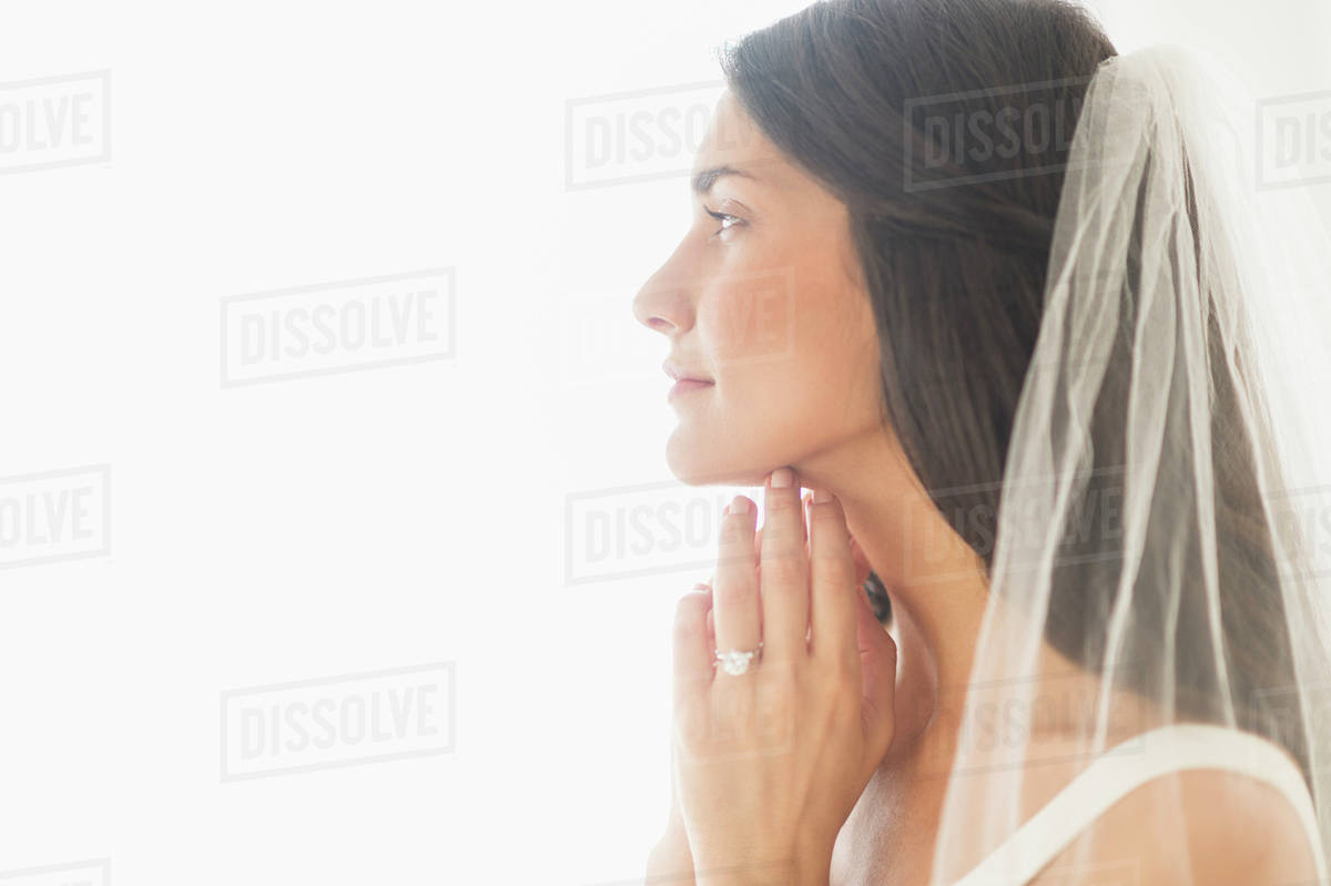 Studio shot of bride - Stock Photo - Dissolve