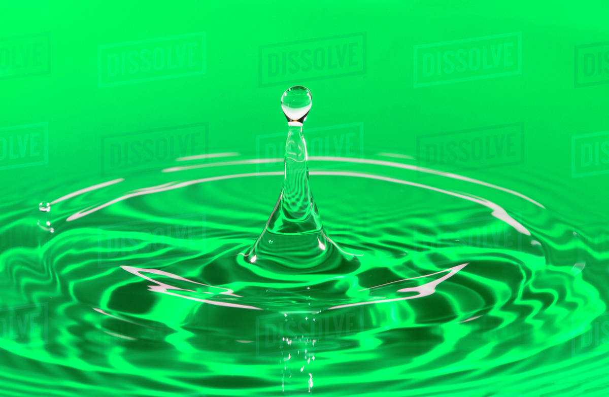 Green water splashing - Stock Photo - Dissolve