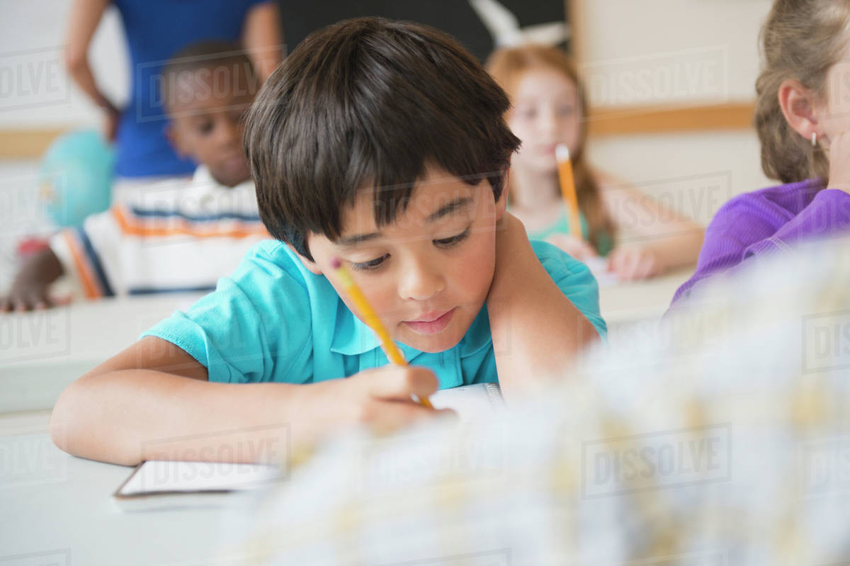 School children (8-9) learning in classroom - Royalty-free Stock Photo ...