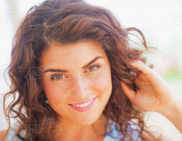 Portrait of smiling woman - Royalty-free Stock Photo | Dissolve