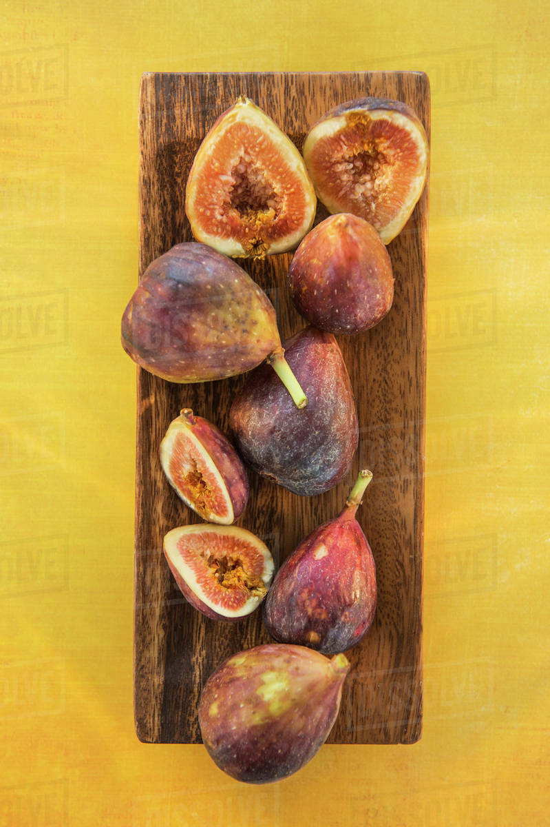 Figs on wood tray - Stock Photo - Dissolve
