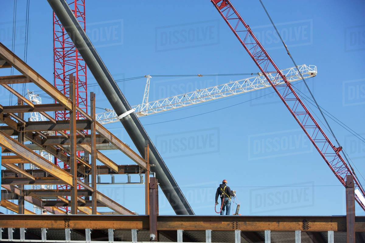 Construction frame and crane - Stock Photo - Dissolve