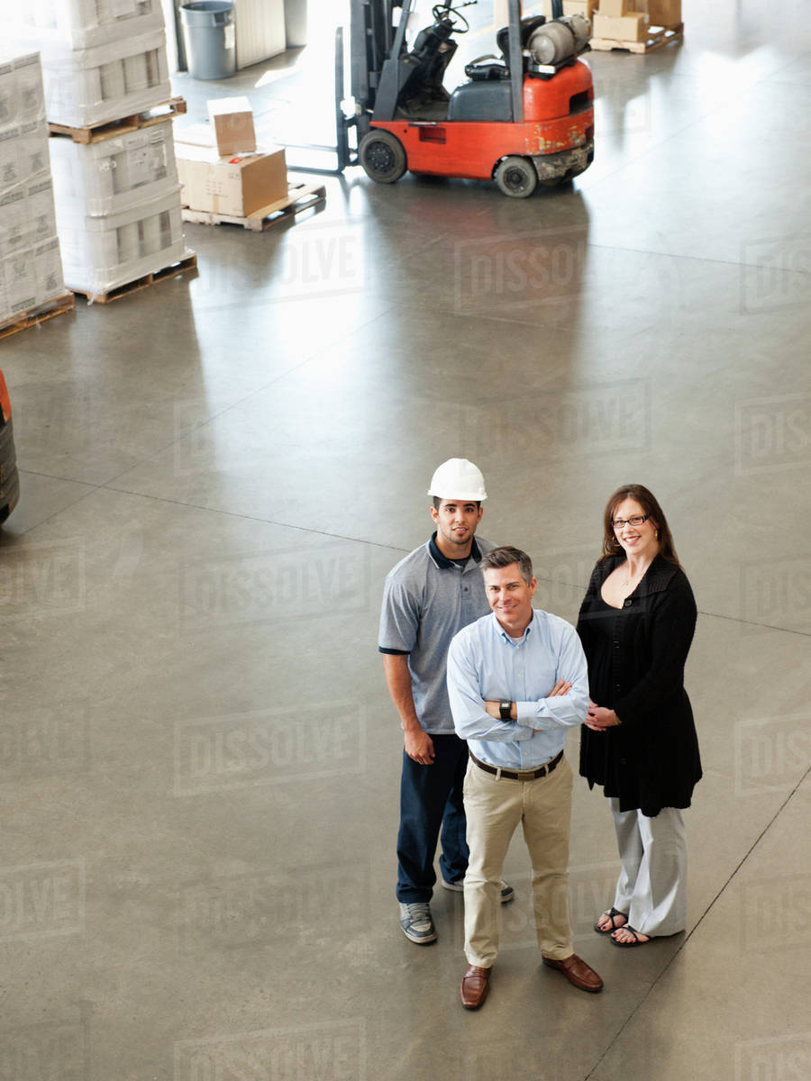 Portrait of warehouse workers - Royalty-free Stock Photo | Dissolve