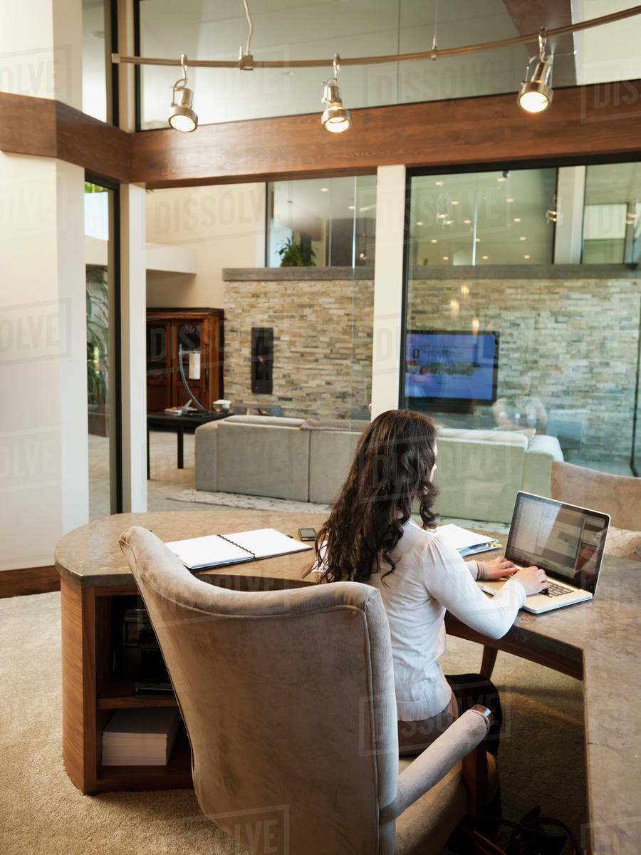 Woman working from home - Royalty-free Stock Photo | Dissolve