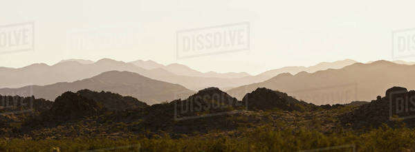 Several mountain ranges backlit by morning sun - Royalty-free Stock ...