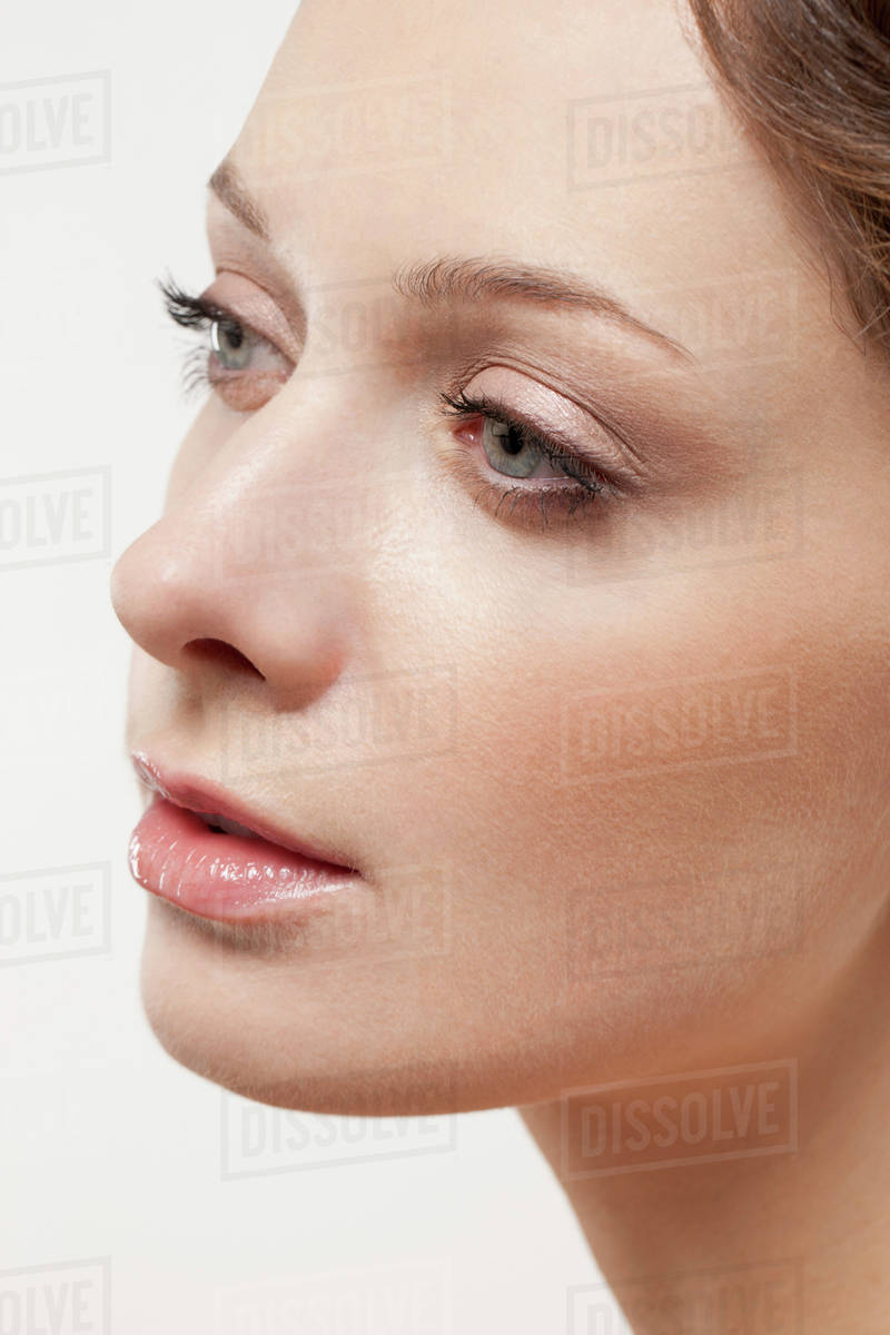 Close up of young woman's face, studio shot - Royalty-free Stock Photo ...