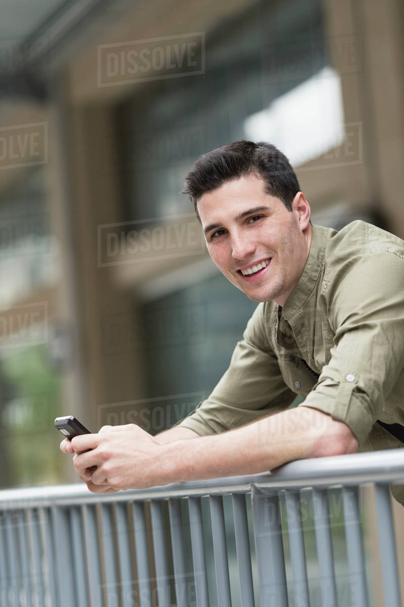 Man text messaging - Stock Photo - Dissolve