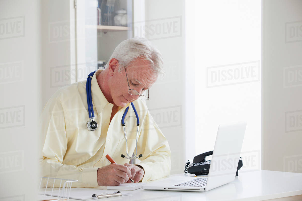 Portrait of senior doctor - Royalty-free Stock Photo | Dissolve